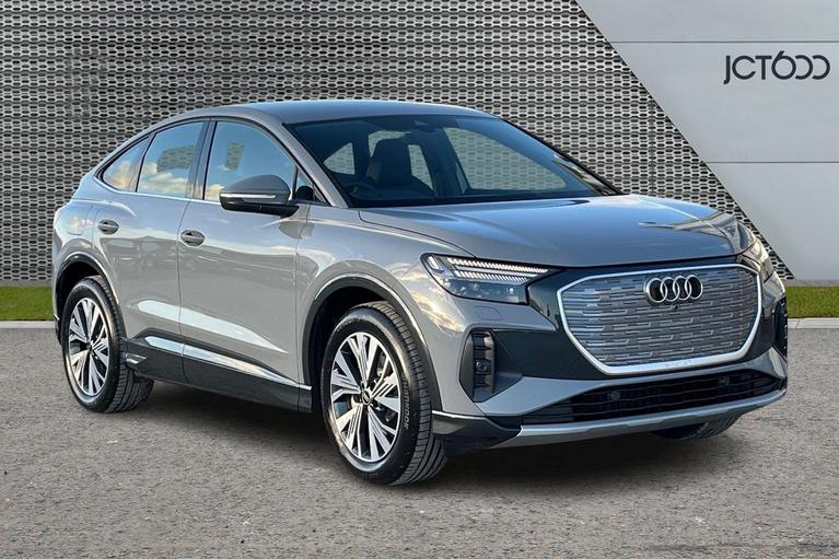 ~ Audi Q4 e-tron Sportback Sport 55 e-tron £56,942 10 miles Pebble grey ...